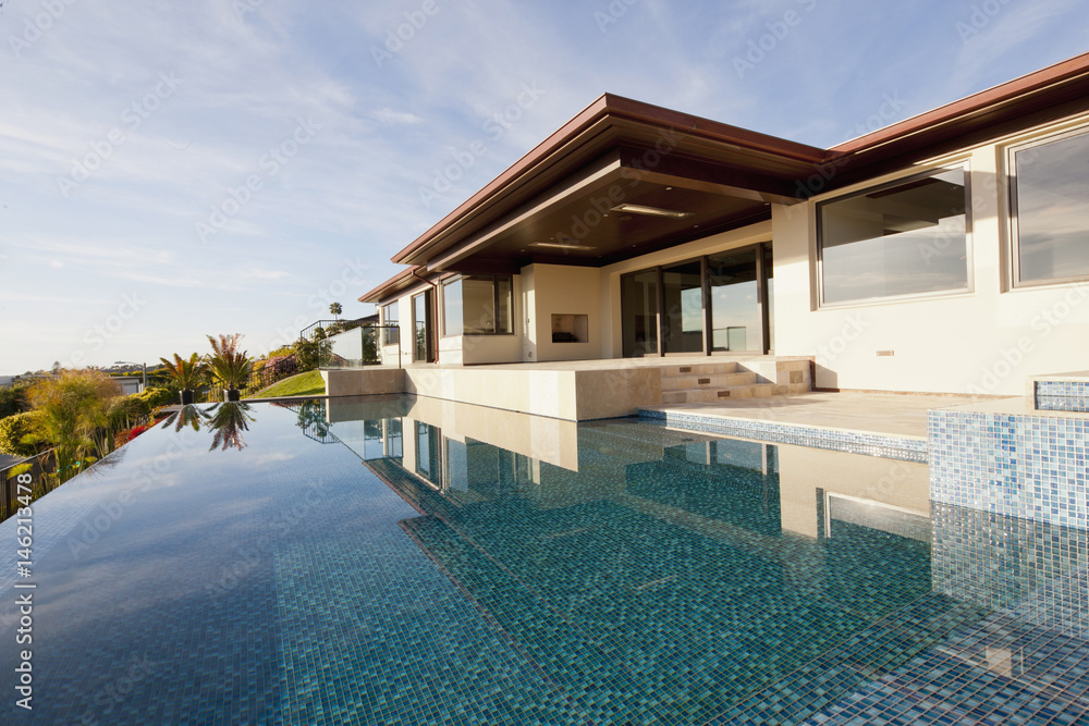 Exterior view of modern house with swimming pool Stock Photo | Adobe Stock