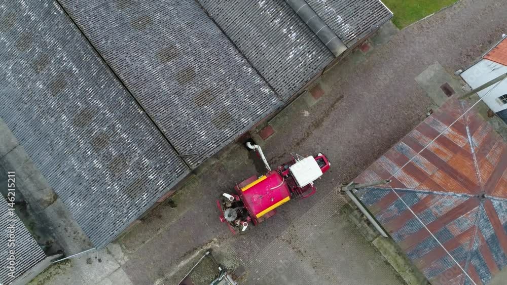 Aerial top down view of modern agricultural machinery manure injector ...