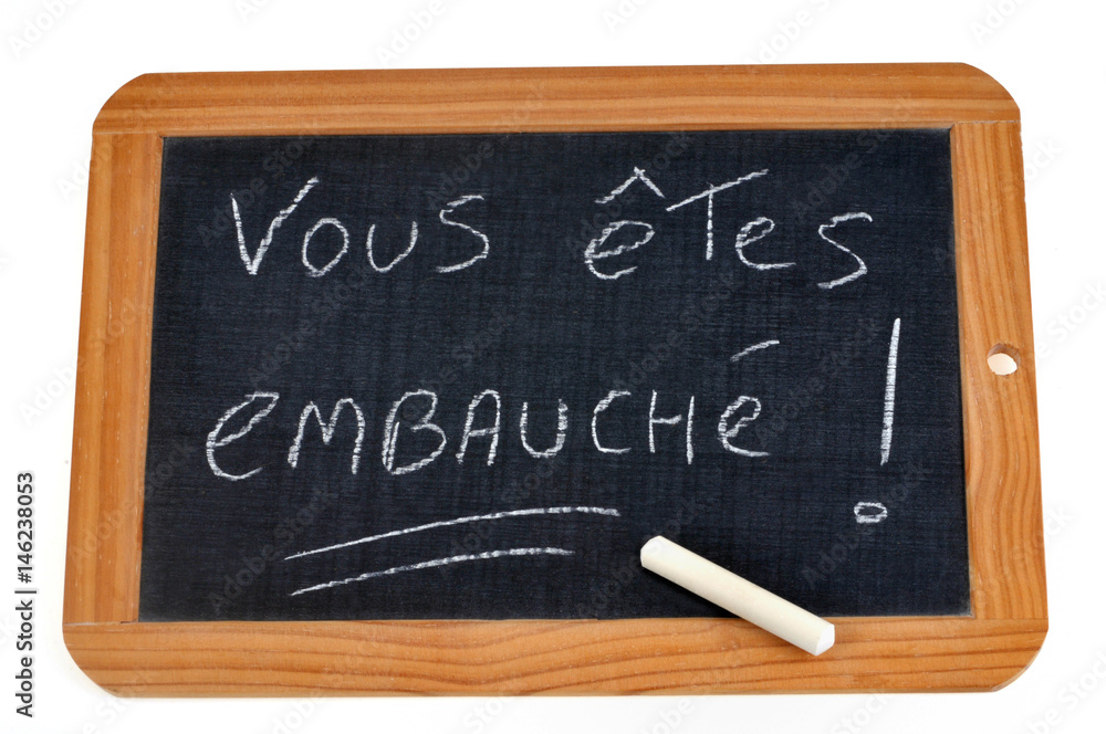 Vous êtes embauché écrit sur une ardoise Stock Photo | Adobe Stock