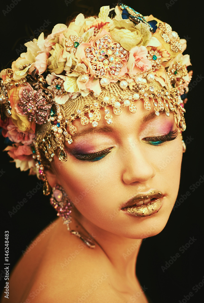 Hairstyle and make up. Gold earrings. Beauty Fashion model girl with ...