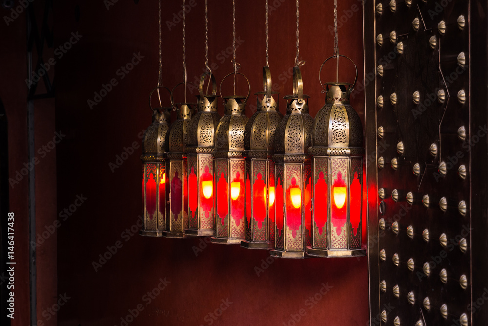 Vintage moroccan laterns hanging near the door covered with copper ...