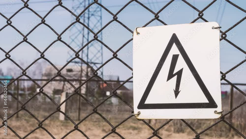 High - voltage substation. Warning sign of danger. Electric shock ...