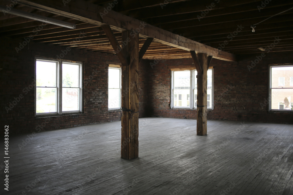 Beautiful Loft Space with Exposed Beams and Brick Stock Photo | Adobe Stock