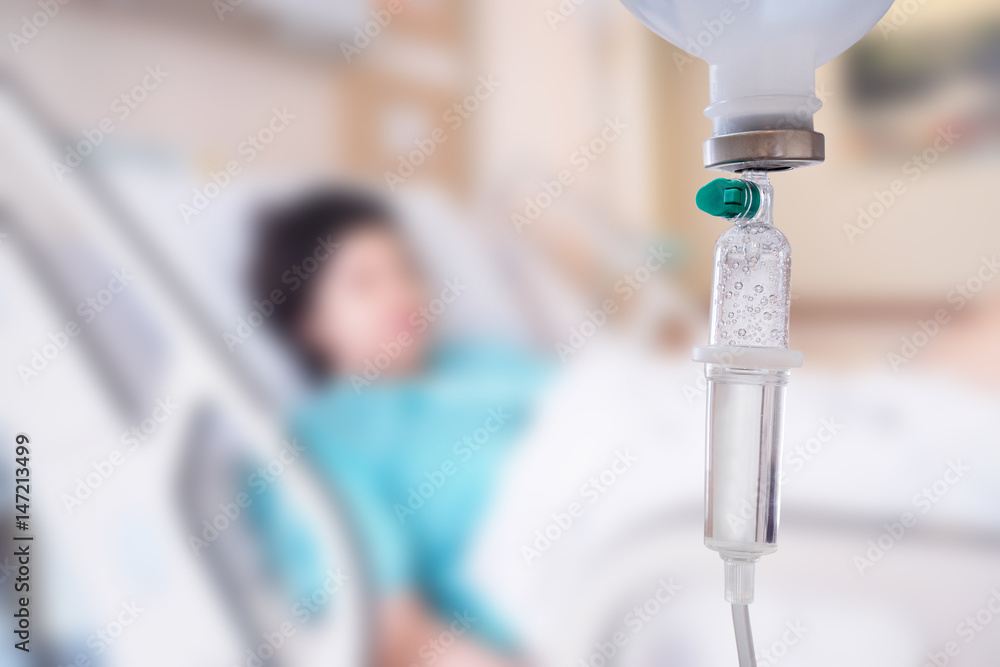 Medical drip with patient in the hospital blurred background Stock-Foto ...