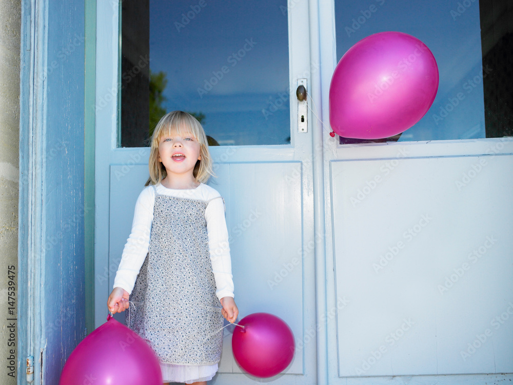 Girl with pink balloons Stock Photo | Adobe Stock