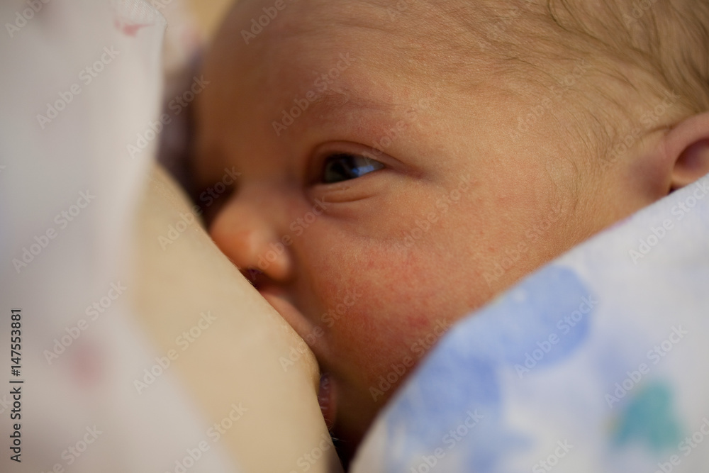 Mother breastfeeding newborn baby boy Stock Photo | Adobe Stock