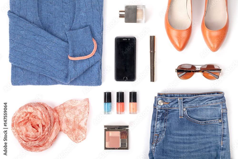 woman clothes, phone and accessories set on white background top view ...