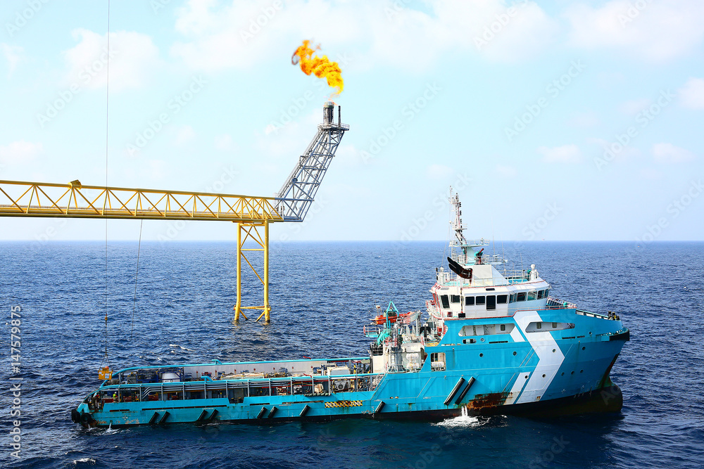 Supply boat transfer cargo to oil and gas industry and moving cargo ...