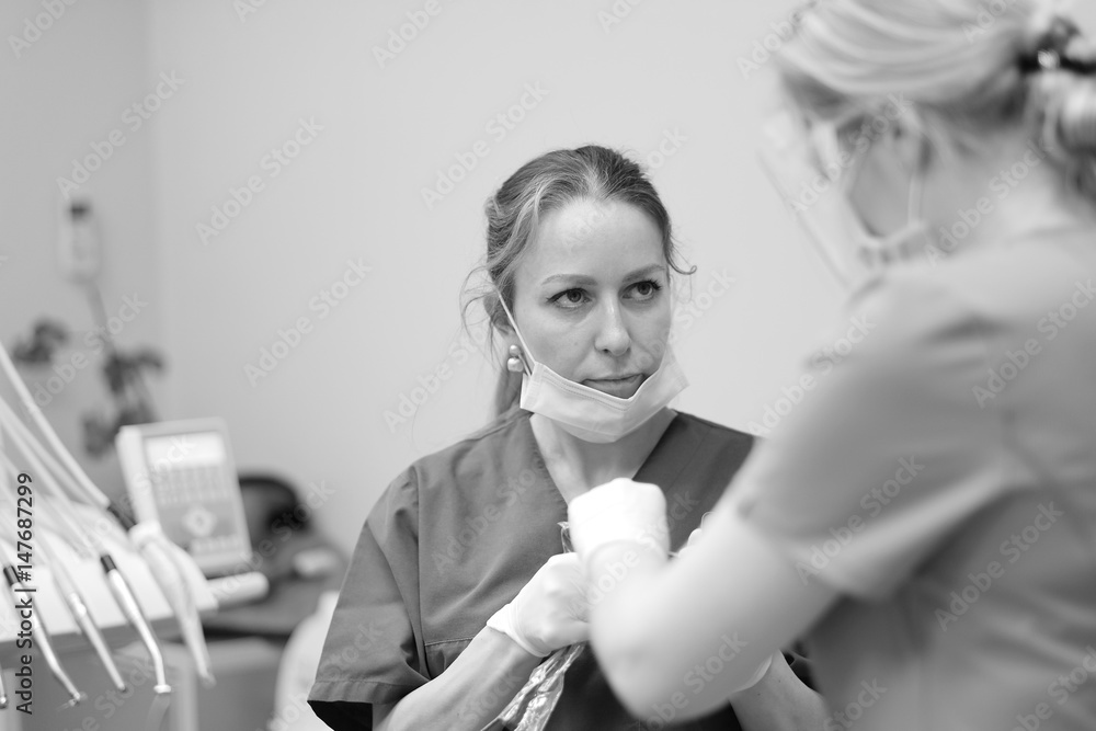 The doctor performs medical manipulations in the treatment of a patient ...