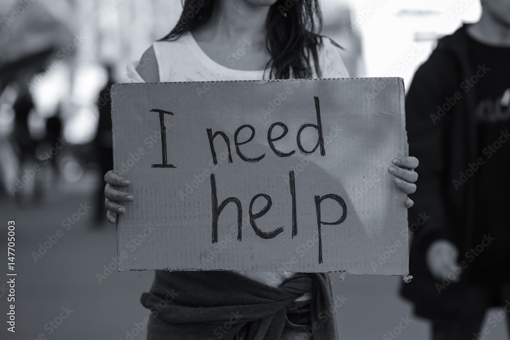 Poor woman begging for help on the street Stock Photo | Adobe Stock