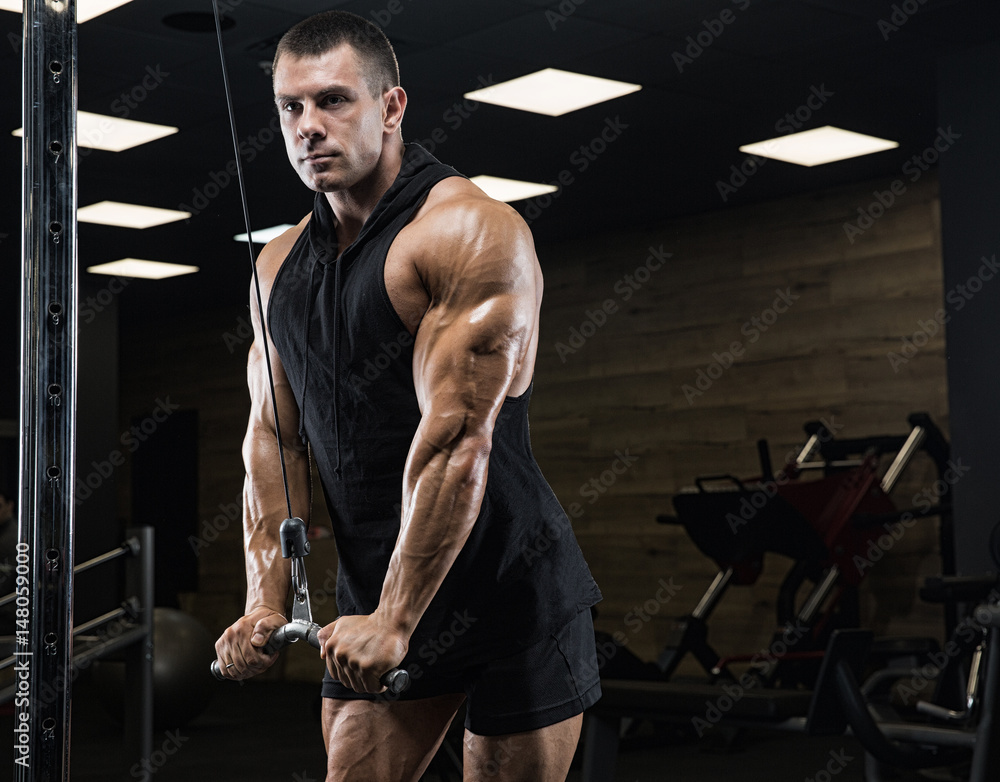 Brutal strong athletic men pumping up muscles workout bodybuilding ...