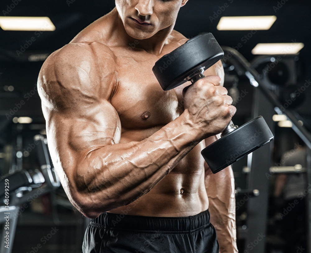 Brutal strong athletic men pumping up muscles workout bodybuilding ...