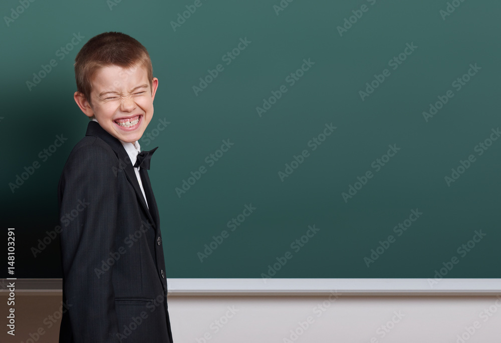 Boy At Blank Chalkboard