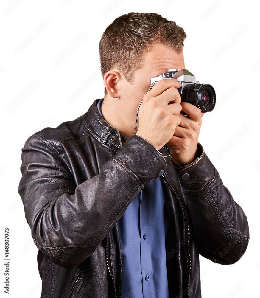 Side view from a young man with a leather jacket holding a vintage ...
