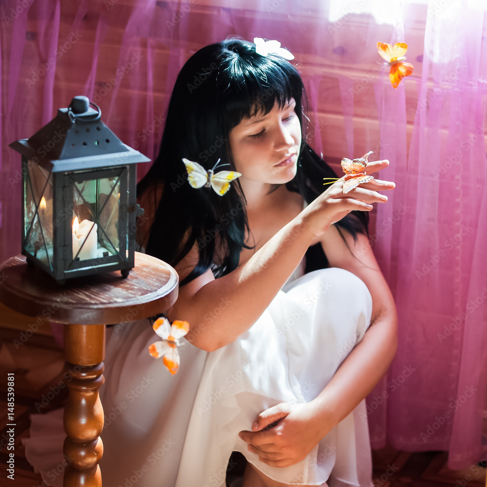 Foto de Alice in Wonderland. Dream. The young dark-haired girl in ...