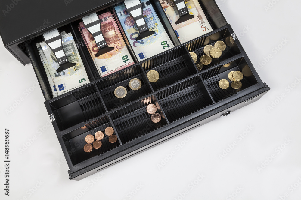 Kasse mit wenig Kleingeld Stock-Foto | Adobe Stock