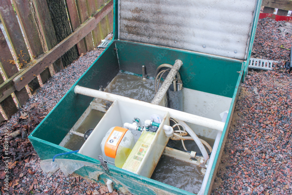 Opened the septic tank to check its functionality. Outdoor Septic Tank ...
