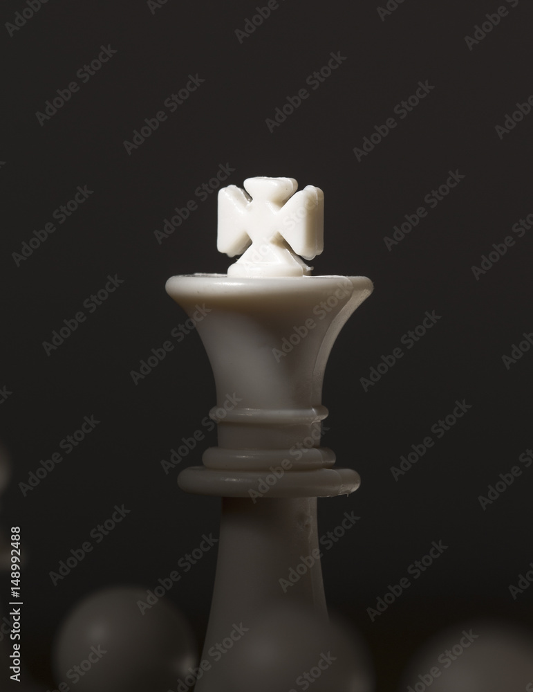 Chess figure king with light on crown. White chess king. Chessmate ...