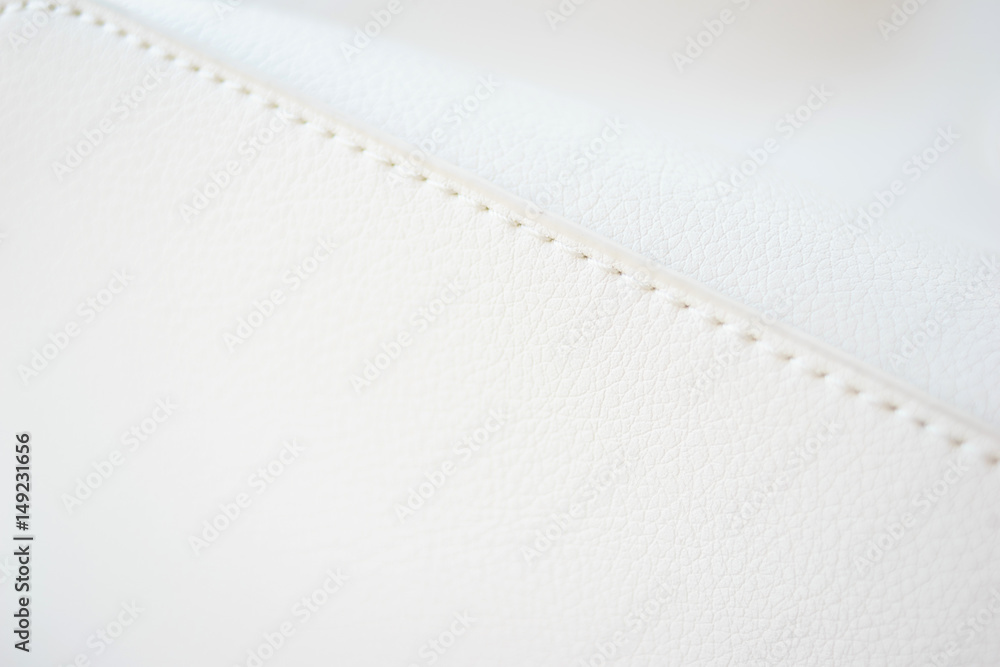 White leather and details of seams close-up. Things made of leather ...