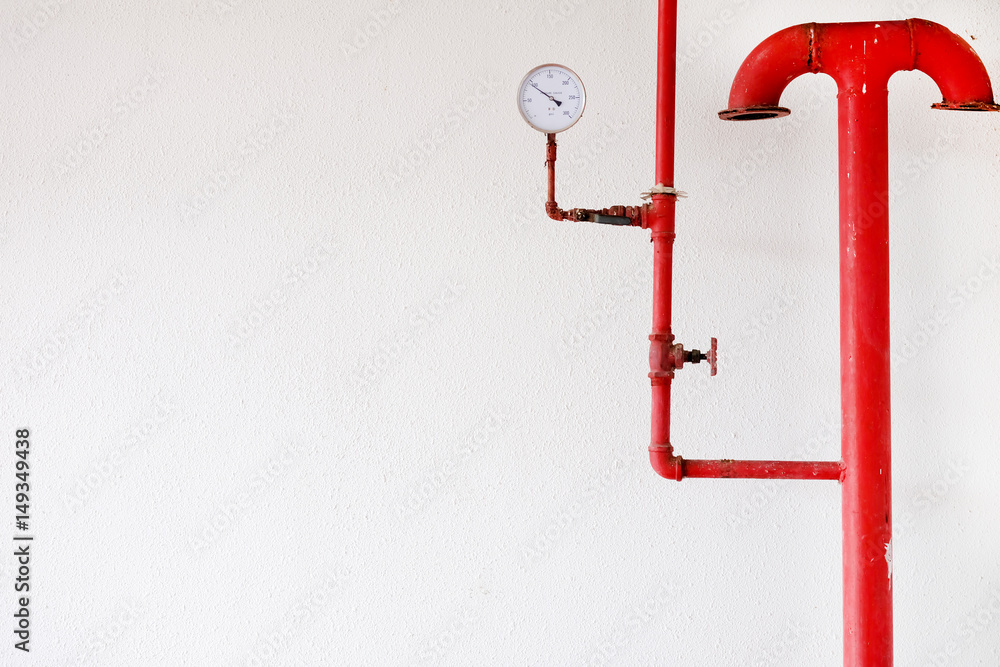 Pressure gauge and water pipe valve water on white wall Stock Photo ...