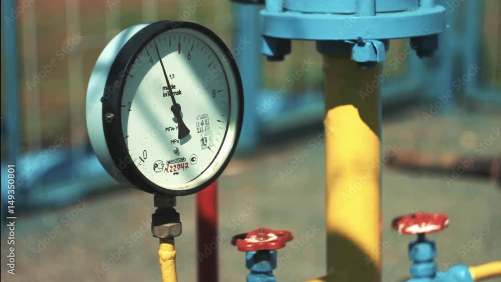 Transportation of gas and oil through pipes. The pressure gauge ...