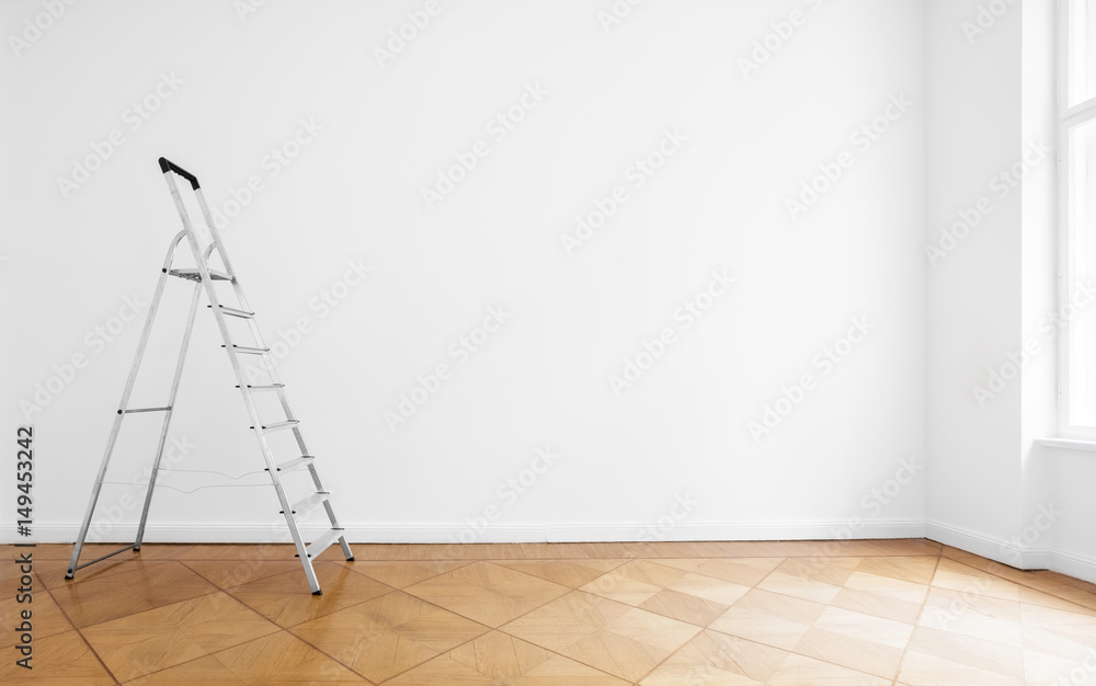 ladder in empty room with white wall and wooden floor Stock Photo ...