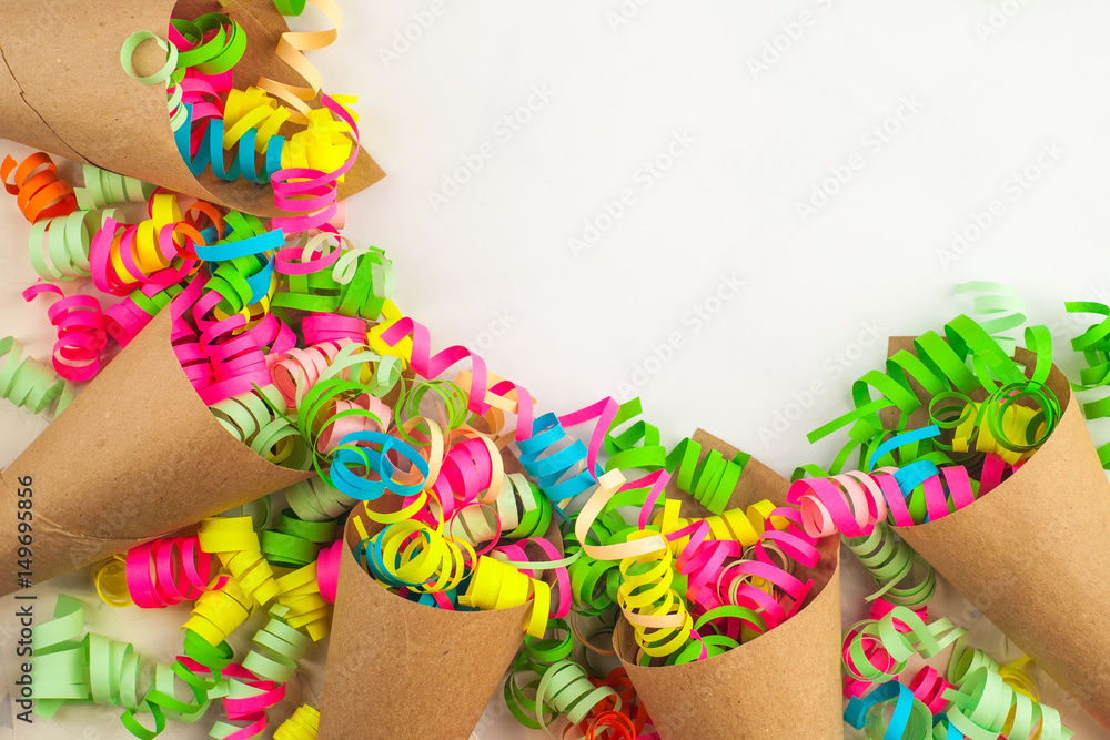 A bright colorful party streamer background. Birthday Swirls are in ...