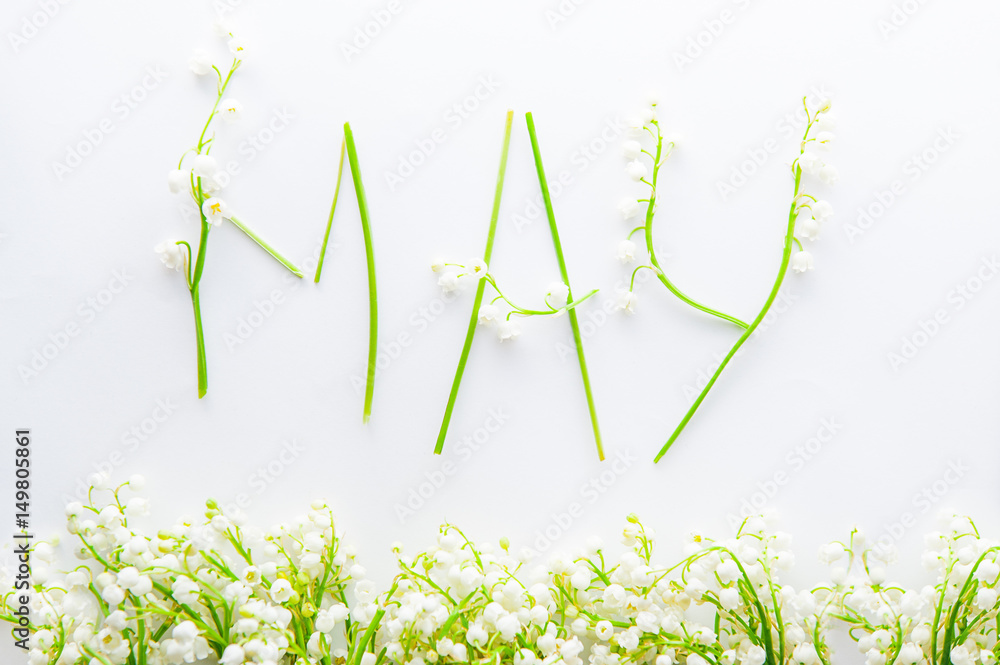 White background with word May - letters made of flowers and leaves ...