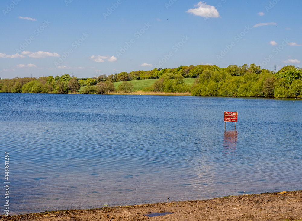 Deep water warning sign to warn swimmers of the danger of swimming in ...