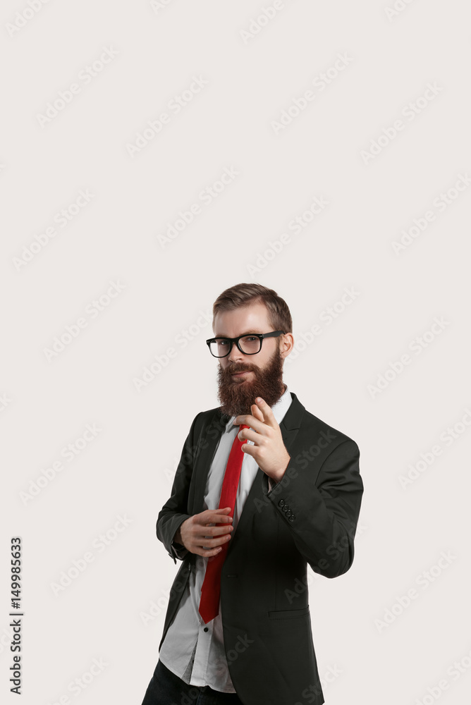 Showman show in camera by finger. Attractive guy with big clean beard ...