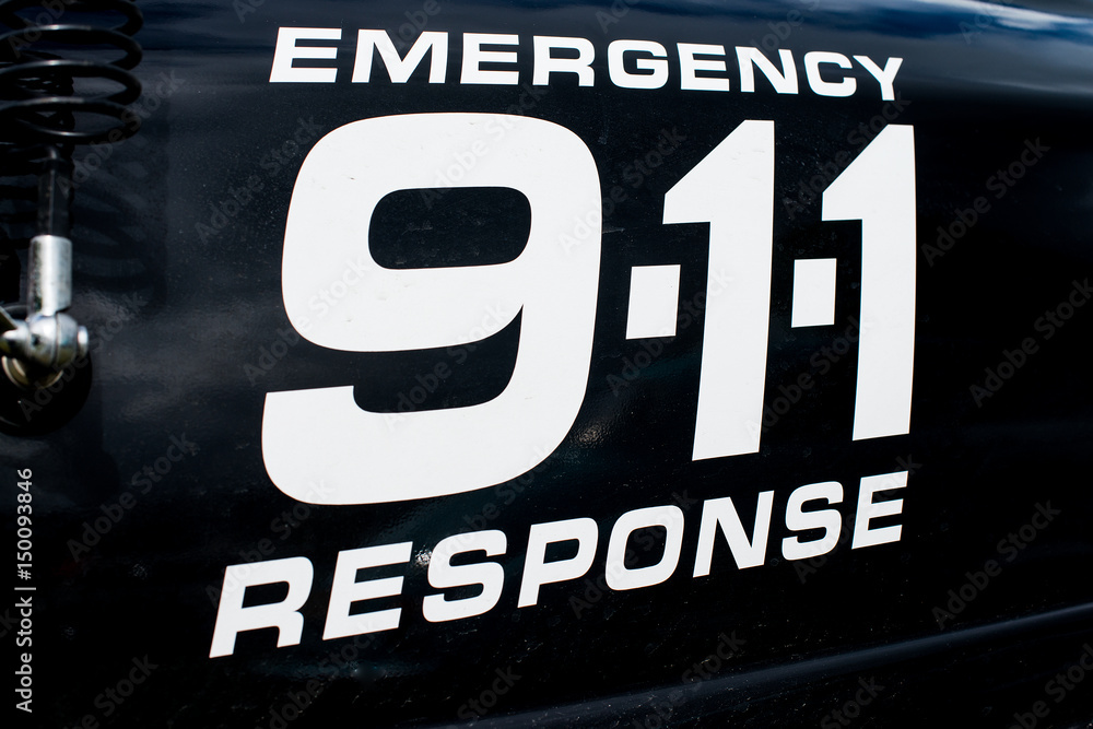 911 Emergency Response sign on side of American police car. Stock Photo ...