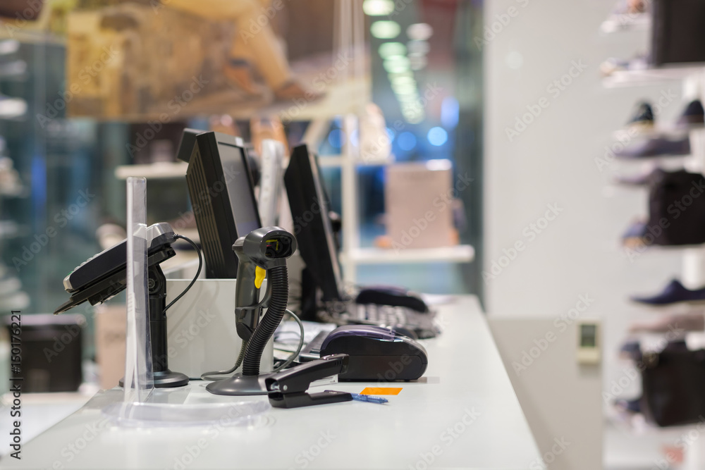 Two cash desks with computer screens and barcode scanners on white ...