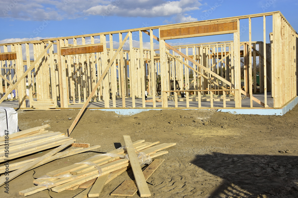 residential wood frame home under construction. Stock Photo | Adobe Stock
