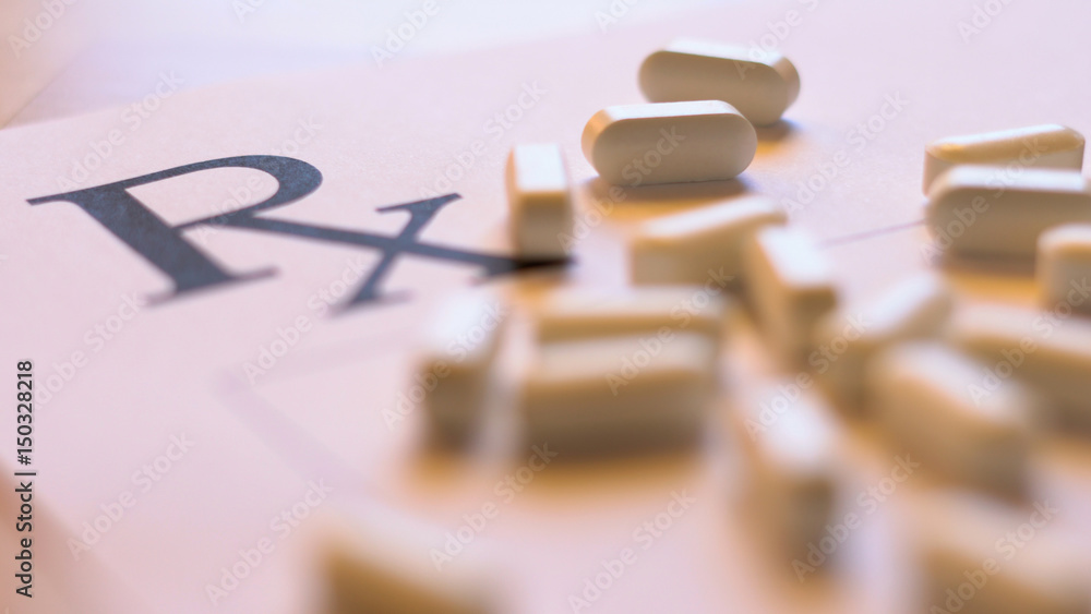 Prescribing, overprescribing prescription pills concept with blank RX ...