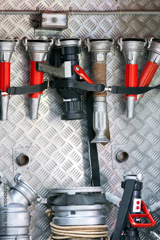 fire engine on standby with equipment storage open Stock Photo | Adobe ...