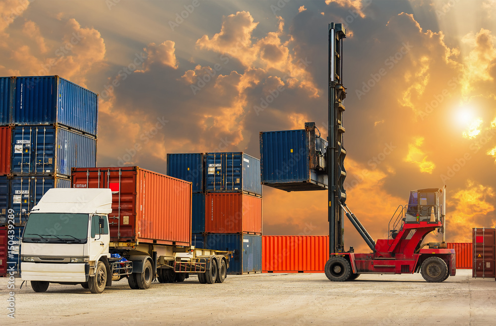 Forklift handling cargo container loading to container trailer in ...