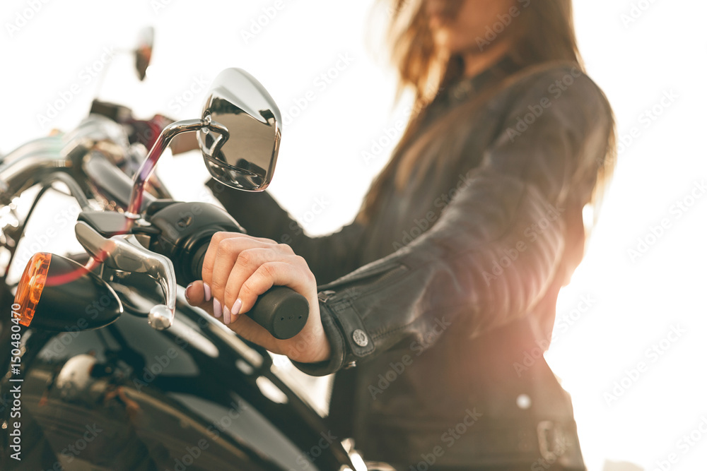 Foto de Girl on a motorcycle. She is beautiful, posing on a motorcycle ...