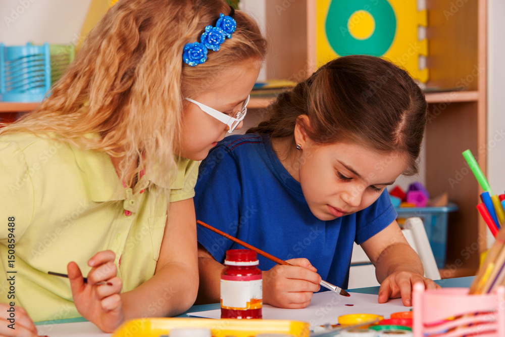 Small students girls painting in art school class. Children drawing by ...