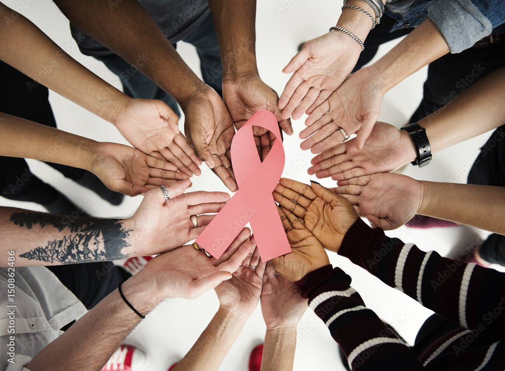 Human hands together holding cancer symbol Stock Photo | Adobe Stock