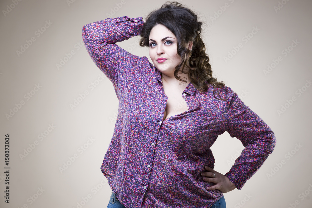 Plus size fashion model in casual clothes, fat woman on studio ...