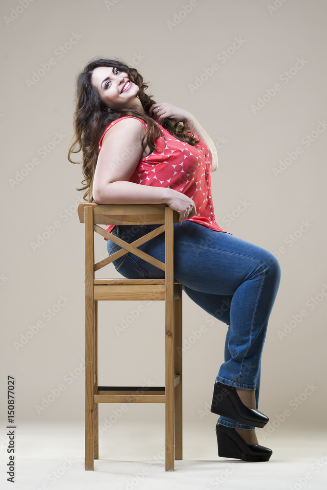 Plus size fashion model in casual clothes, fat woman on studio ...