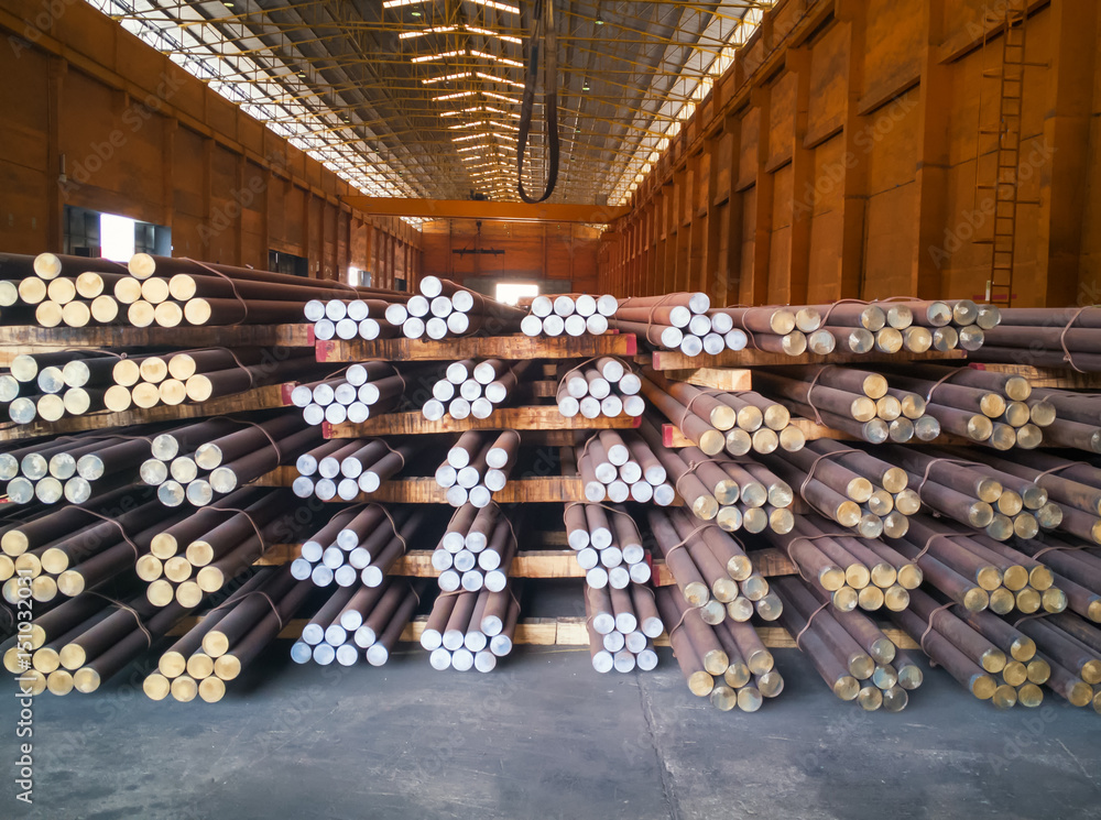 The steel round bars are stacking in warehouse of factory ภาพถ่ายสต็อก ...