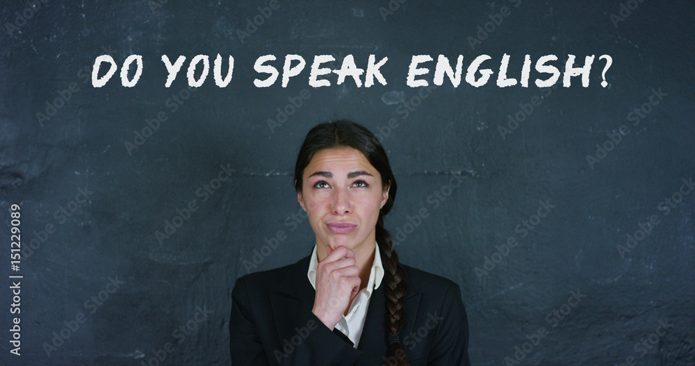 Portrait of a beautiful English teacher, on a black background ...