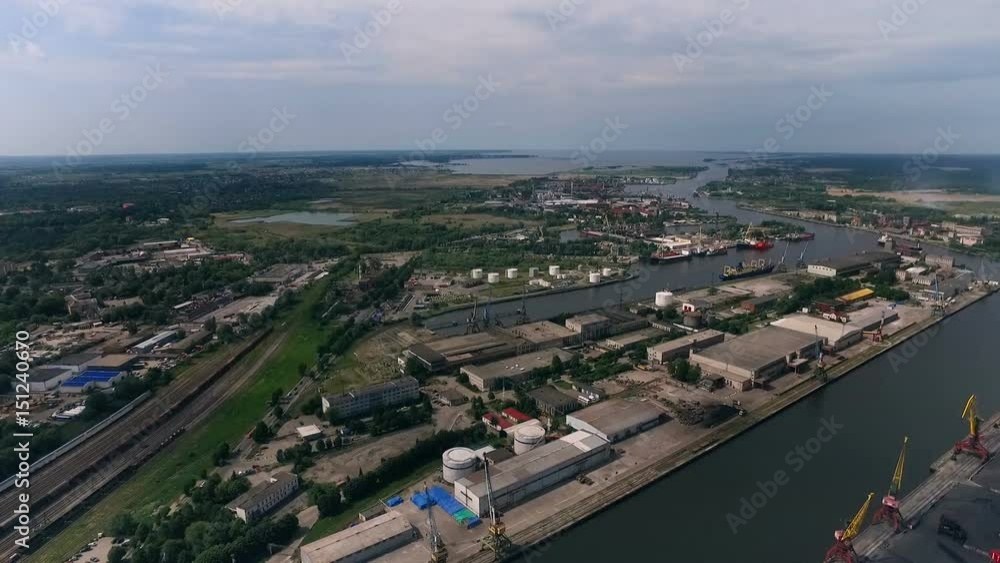 River Port. Ships Staying in Docks. Storage Buildings on Shore ...
