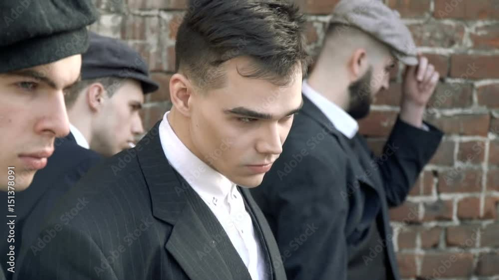 Boys in the costumes from the TV series Peaky blinders Stock Video ...