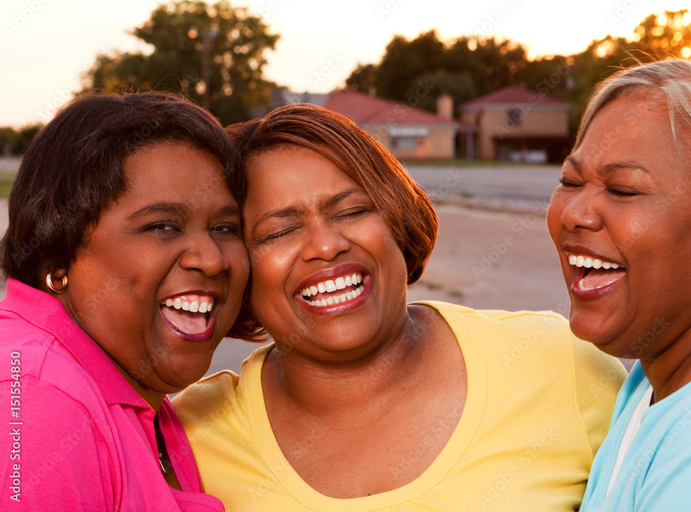 Mature group of women talking and laughing. Stock Photo | Adobe Stock