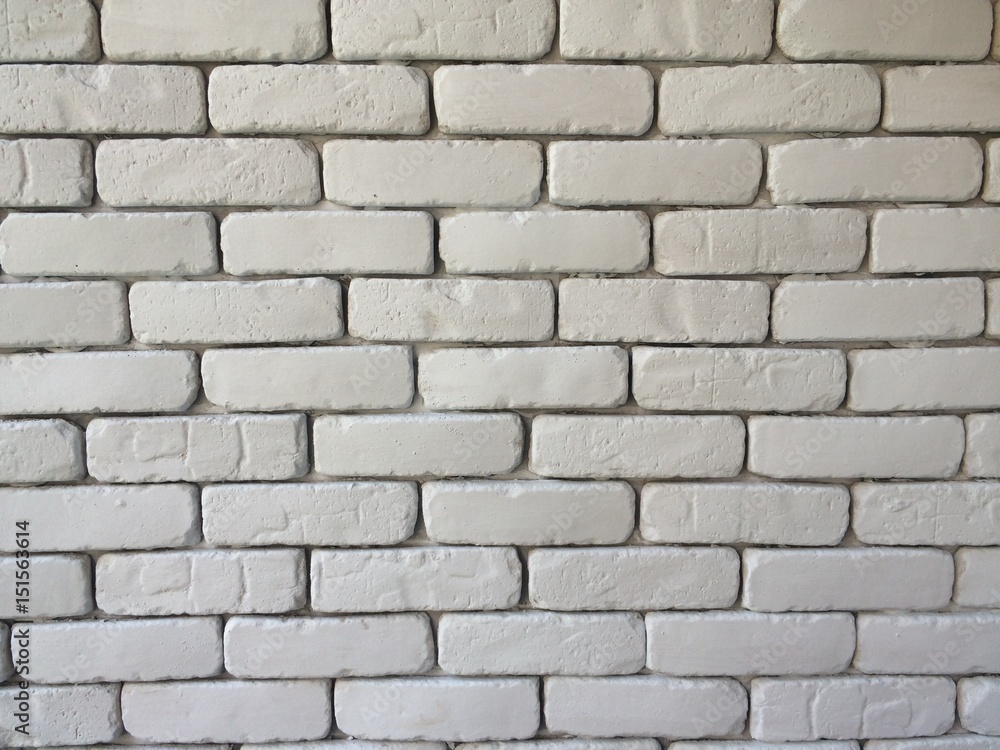 Brick block wall background in living room at home, white wall in house ...