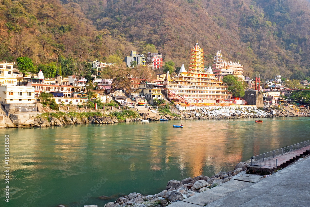 The holy river Ganges in India near Laxman Jhula in India Stock Photo ...