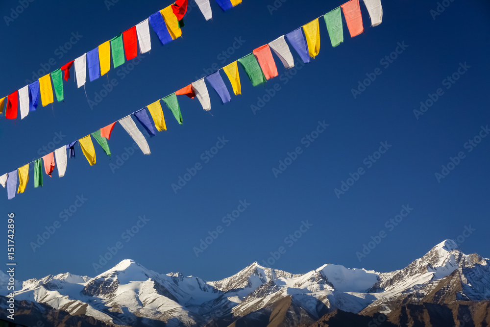 Buddhist prayer flags above the Indian Himalayas in Leh, Ladakh, India ...