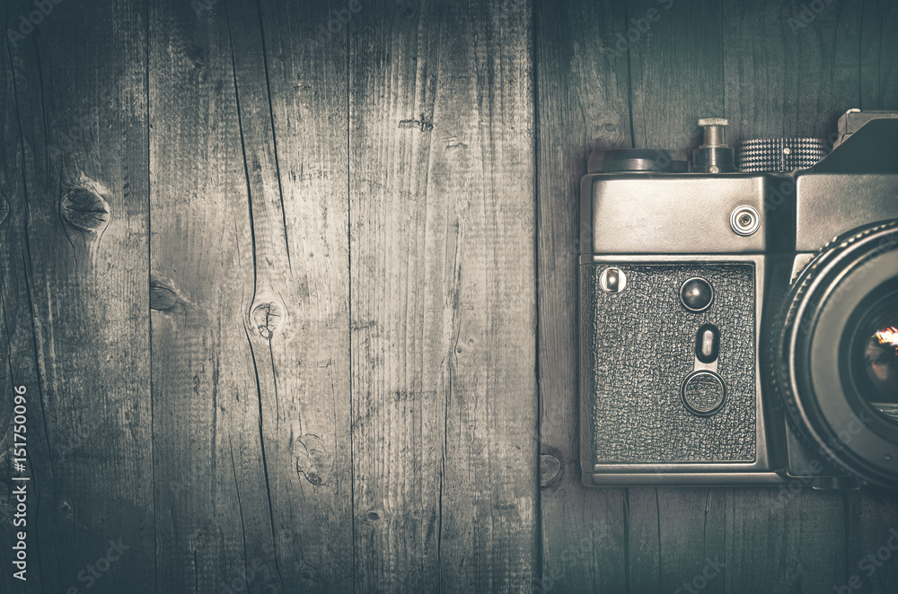 Old camera on wooden background Stock Photo | Adobe Stock